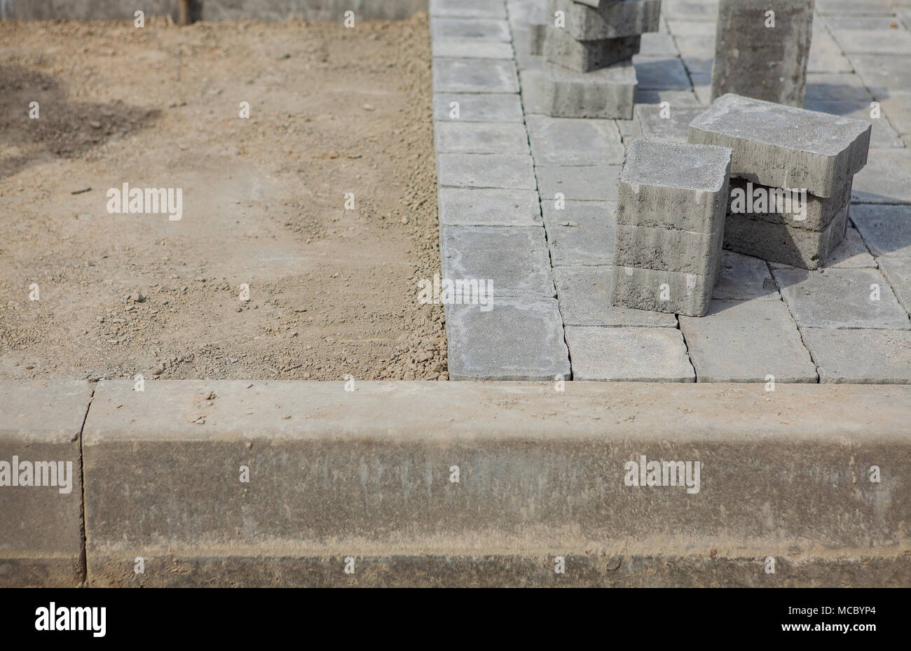 Construction of pavement details, cobblestone pavement, stone blocks on ...