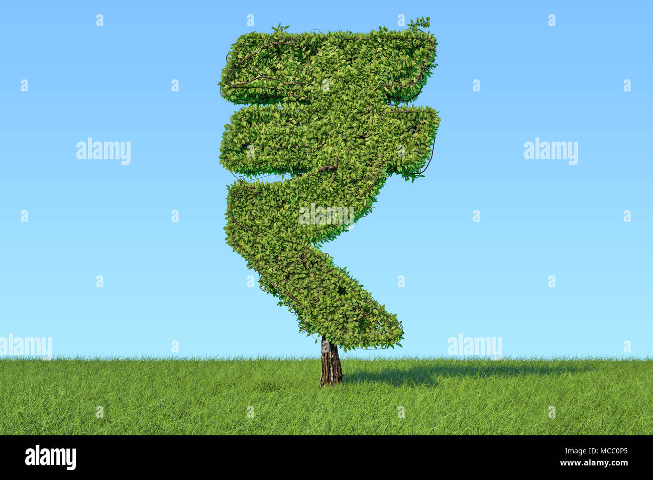 Money tree in the shape of rupee symbol on the green grass against blue ...