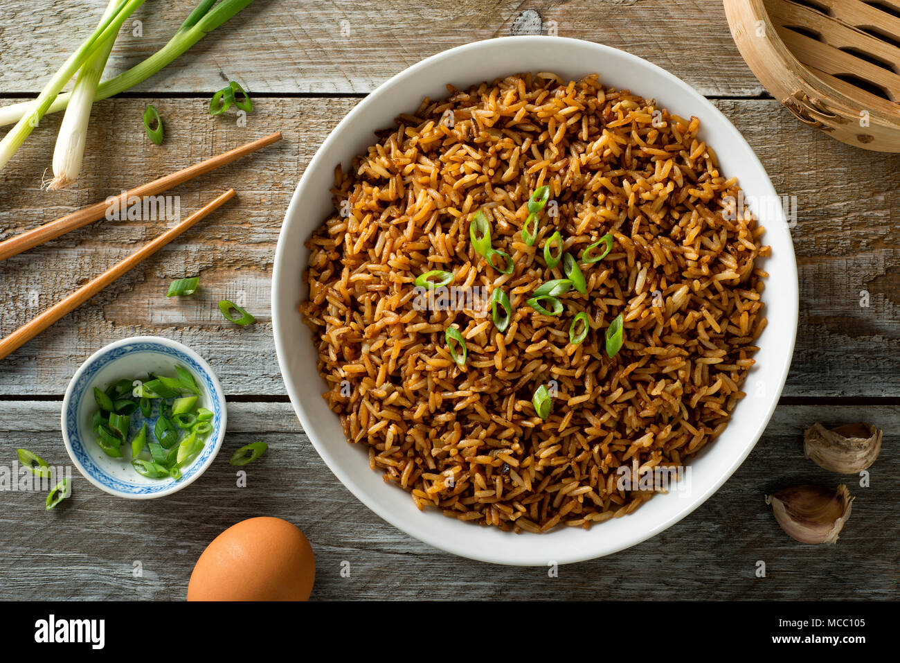 Delicious plain fried rice green onion garnish Stock Photo - Alamy