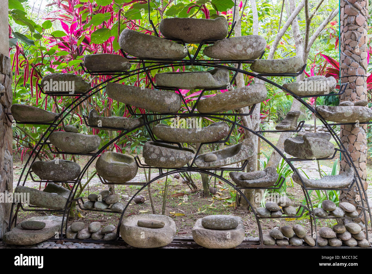 Traditional stone grinders are in display at a museum. Colombia, South ...