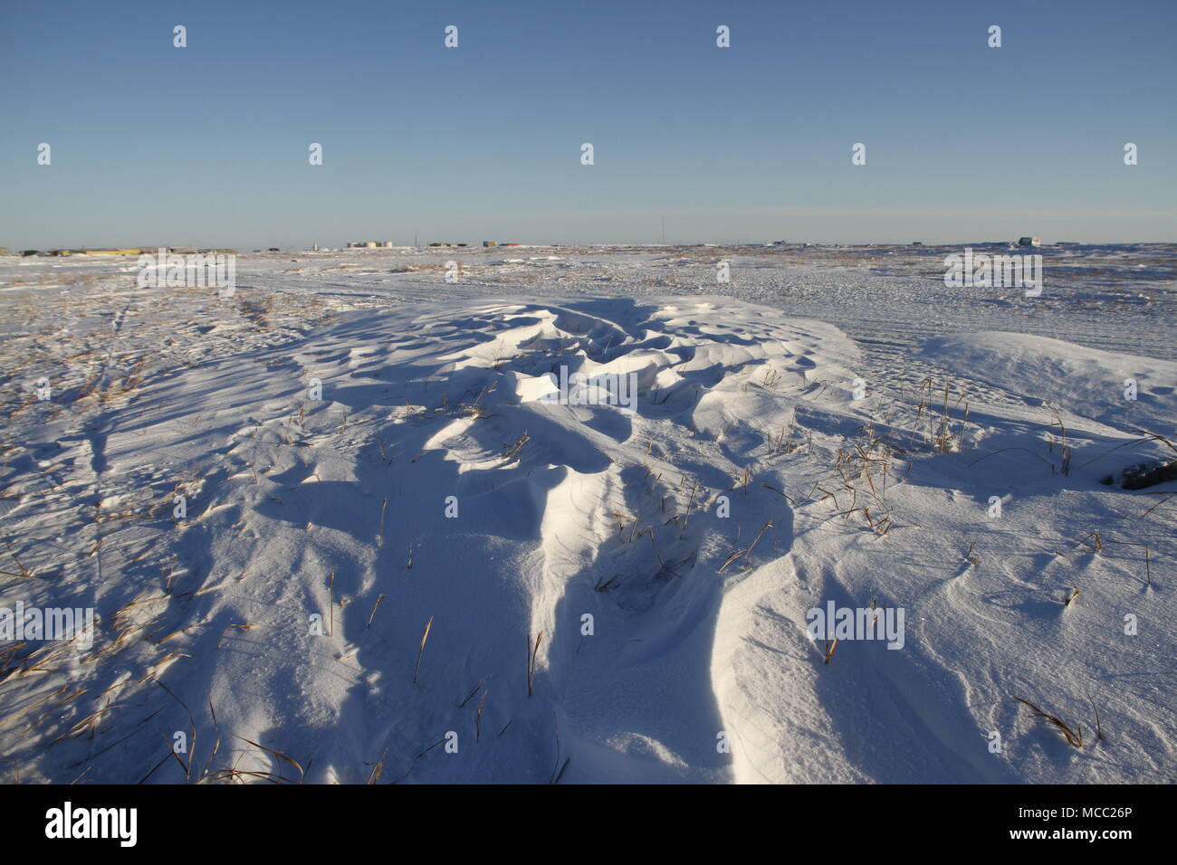 Winter landscape with Sastrugi, wind carved ridges in the snow, near ...