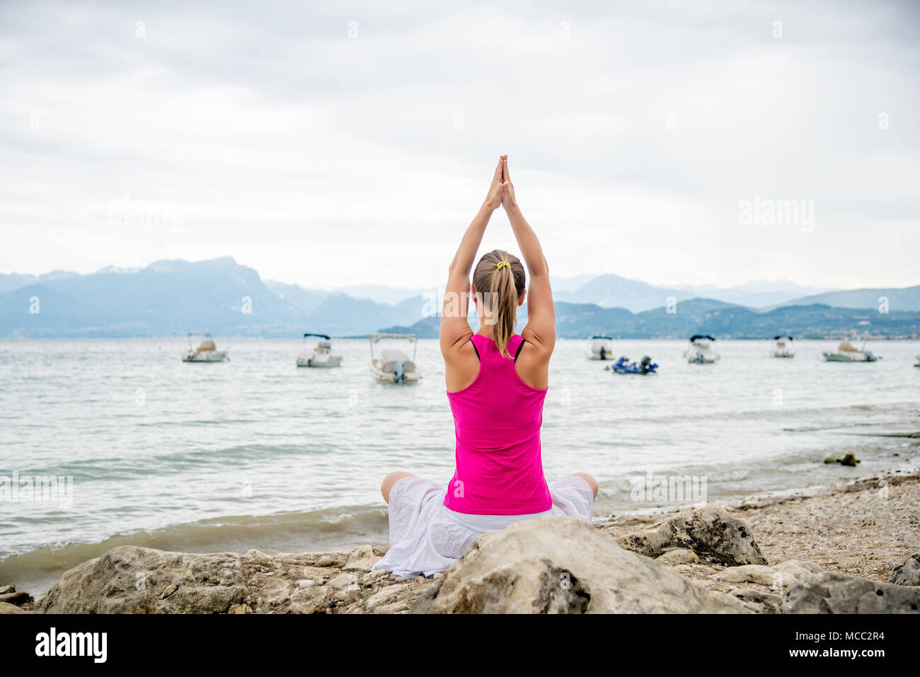 serenity and yoga practicing at the lake Garda. Italy Stock Photo - Alamy