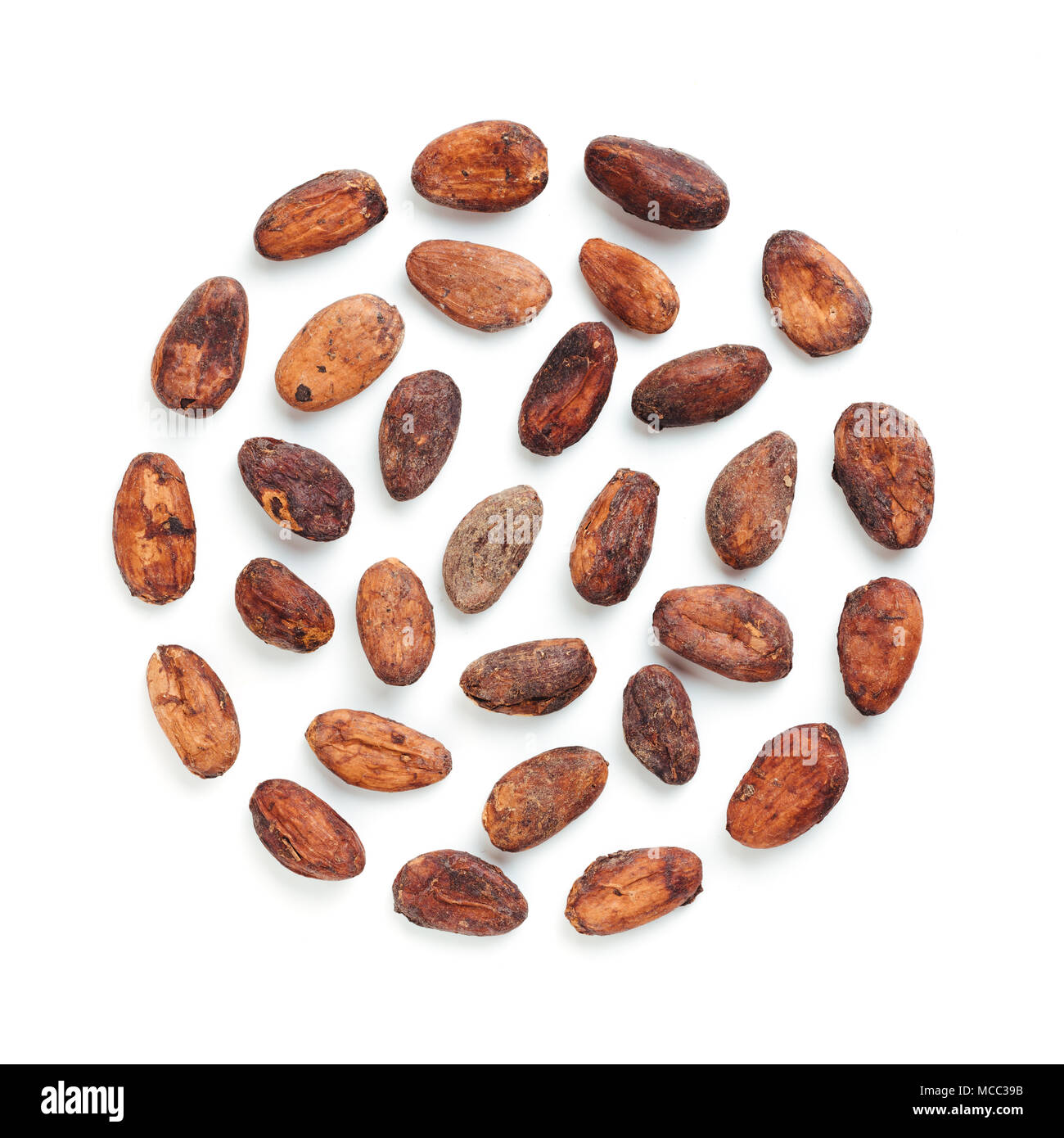Raw cacao beans in creative layout pattern of round form. Cacao beans ...