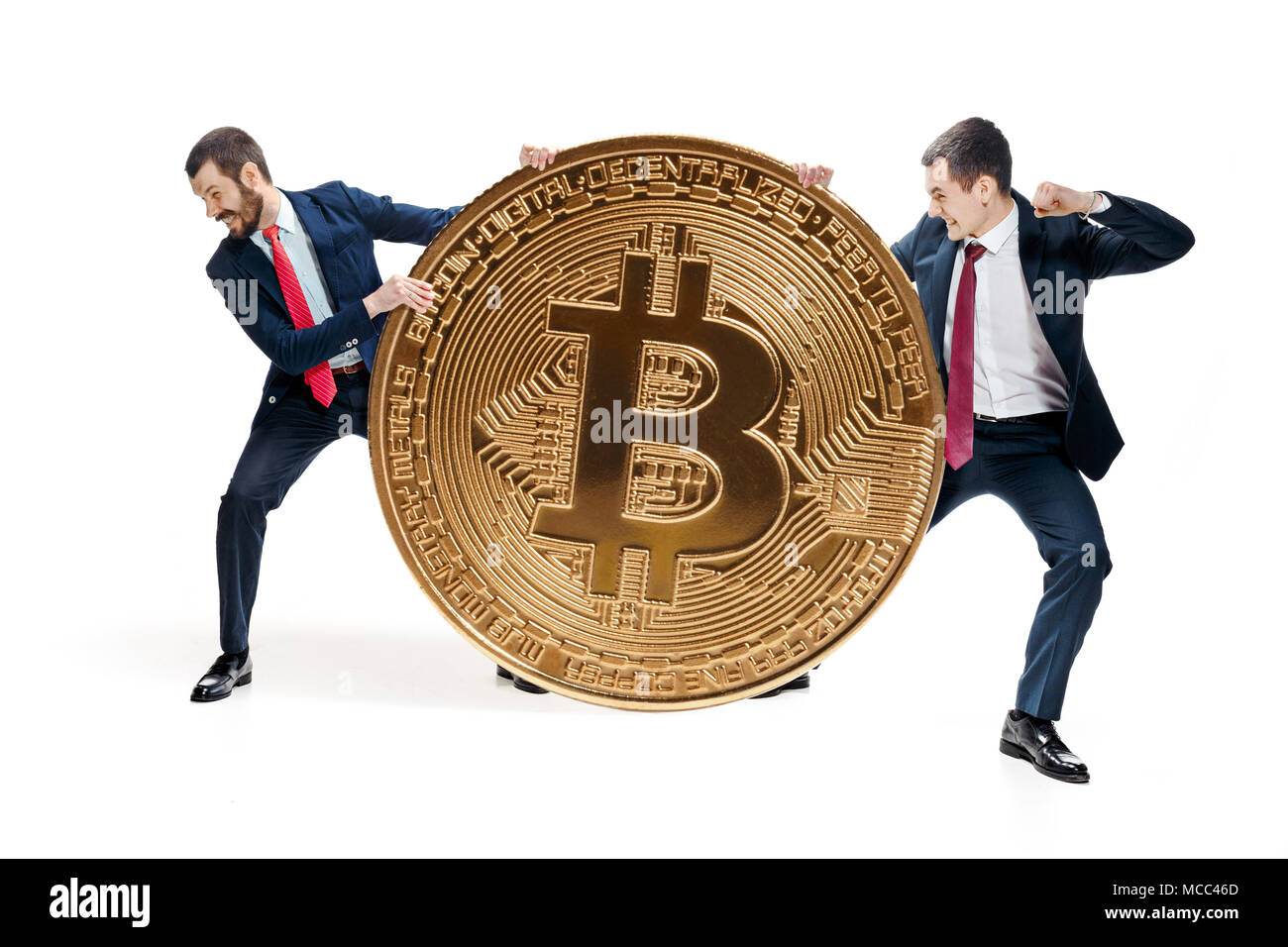Two businessmen holding business icon Stock Photo - Alamy