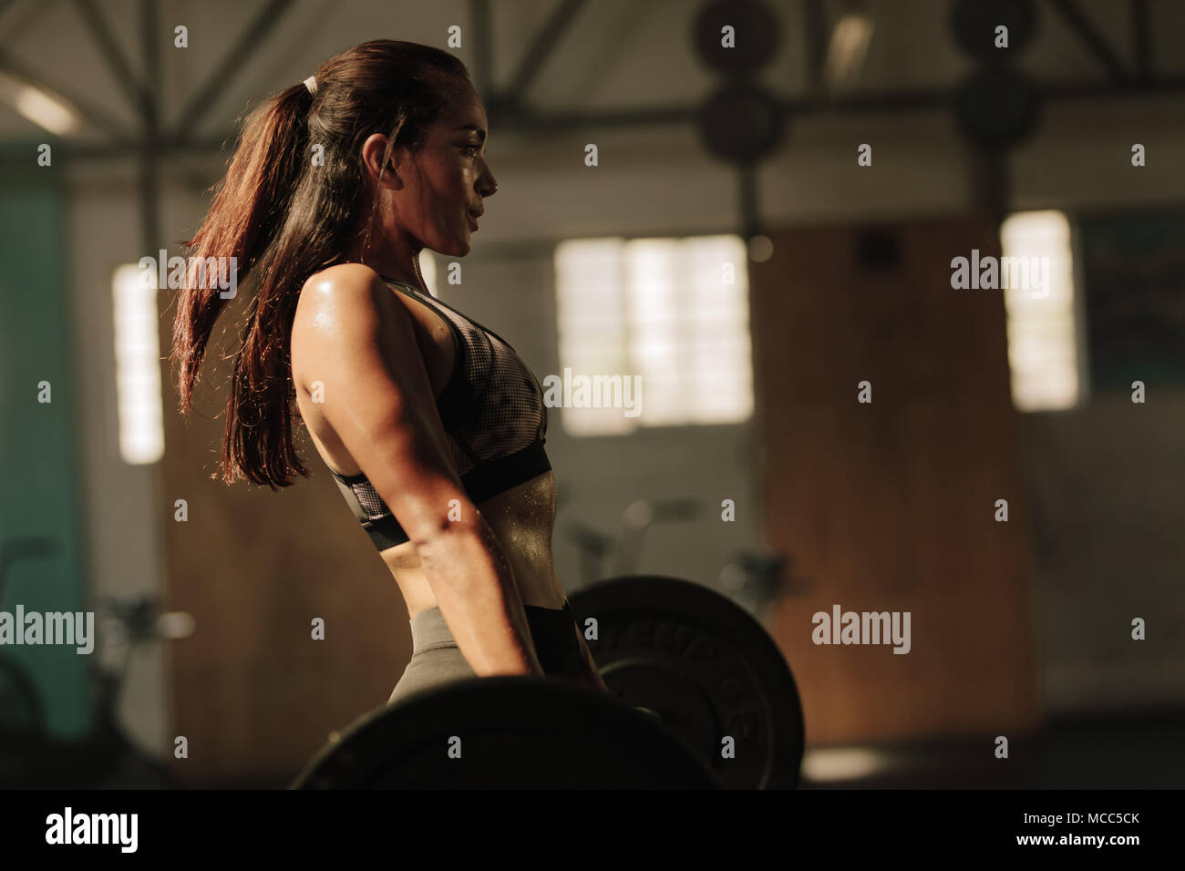 Physically Fit Woman Lifting Heavy Weights Fitness Female Doing Heavy
