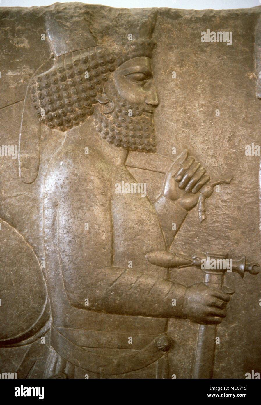 Achaemenid Empire. Persepolis. Relief of shield bearer mede (round cap ...