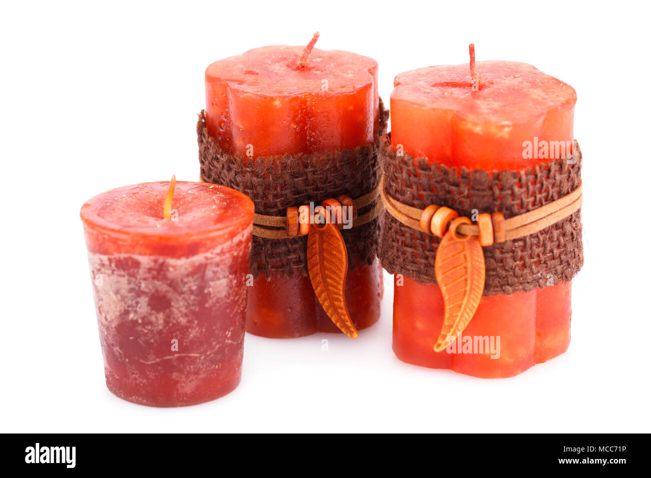 Three candles isolated on white background Stock Photo - Alamy