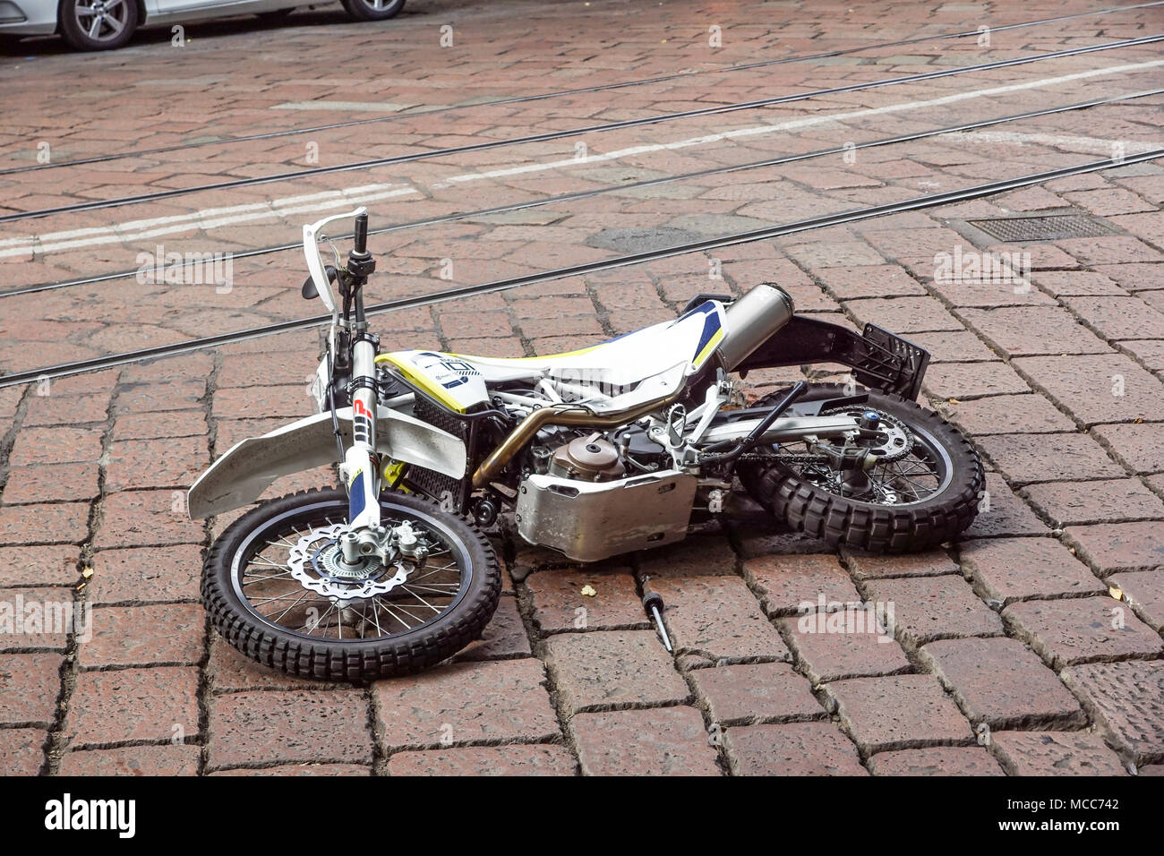 MILAN , ITALY 17 MARCH 2018 : traffic accident of a motorcycle fallen ...