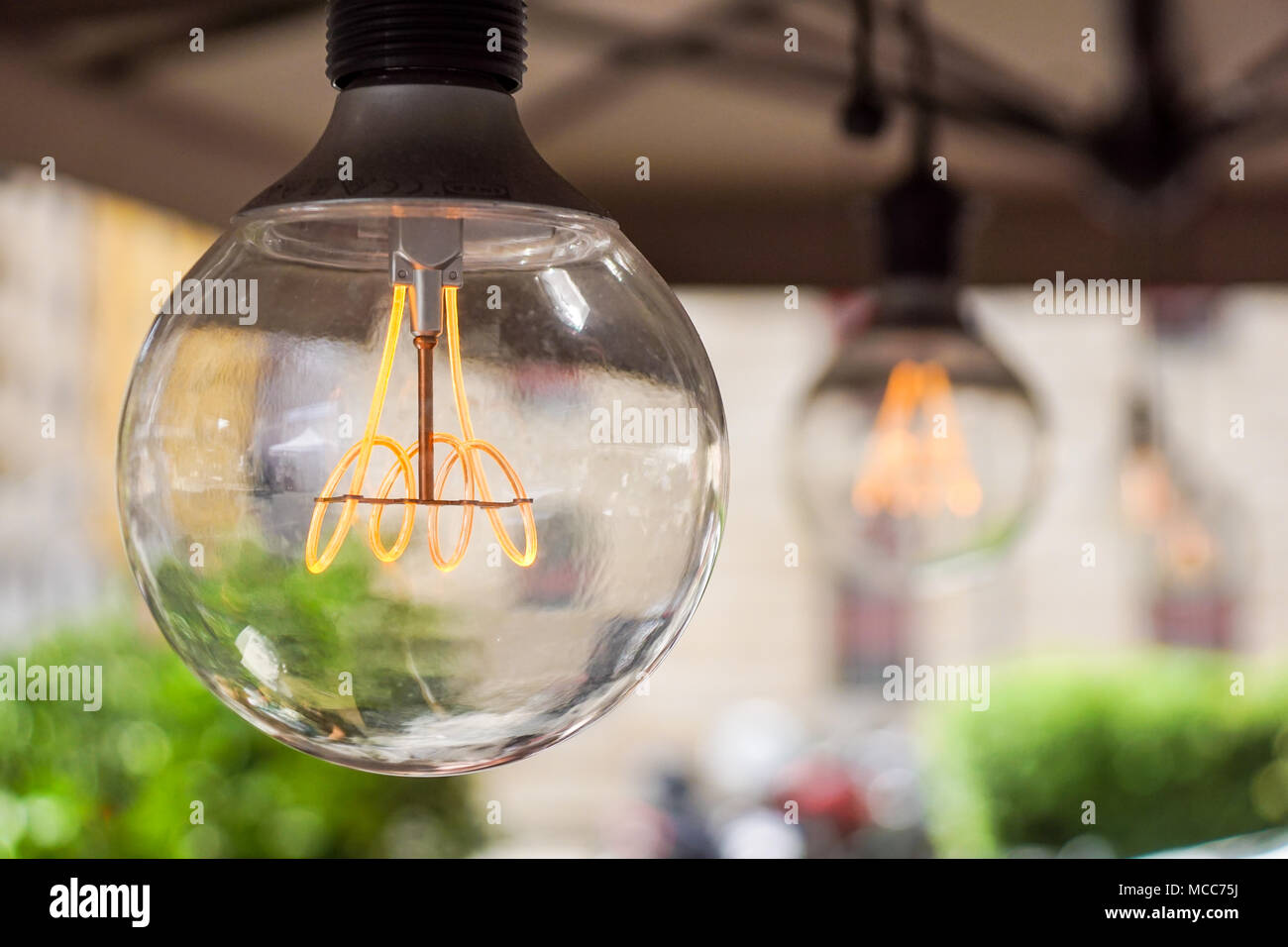 Decorative antique edison style light bulb Stock Photo - Alamy