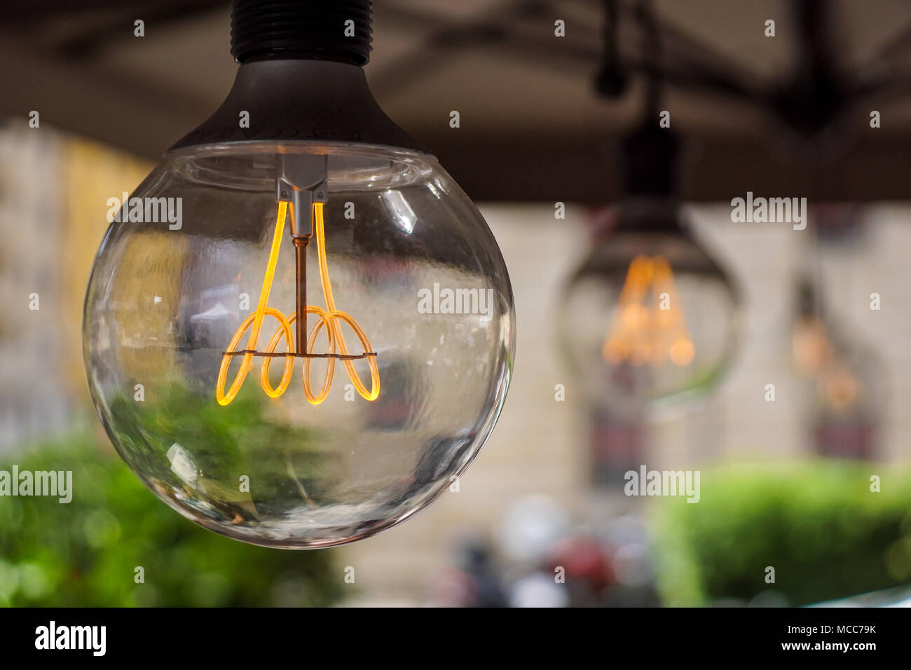 Decorative antique edison style light bulb Stock Photo - Alamy