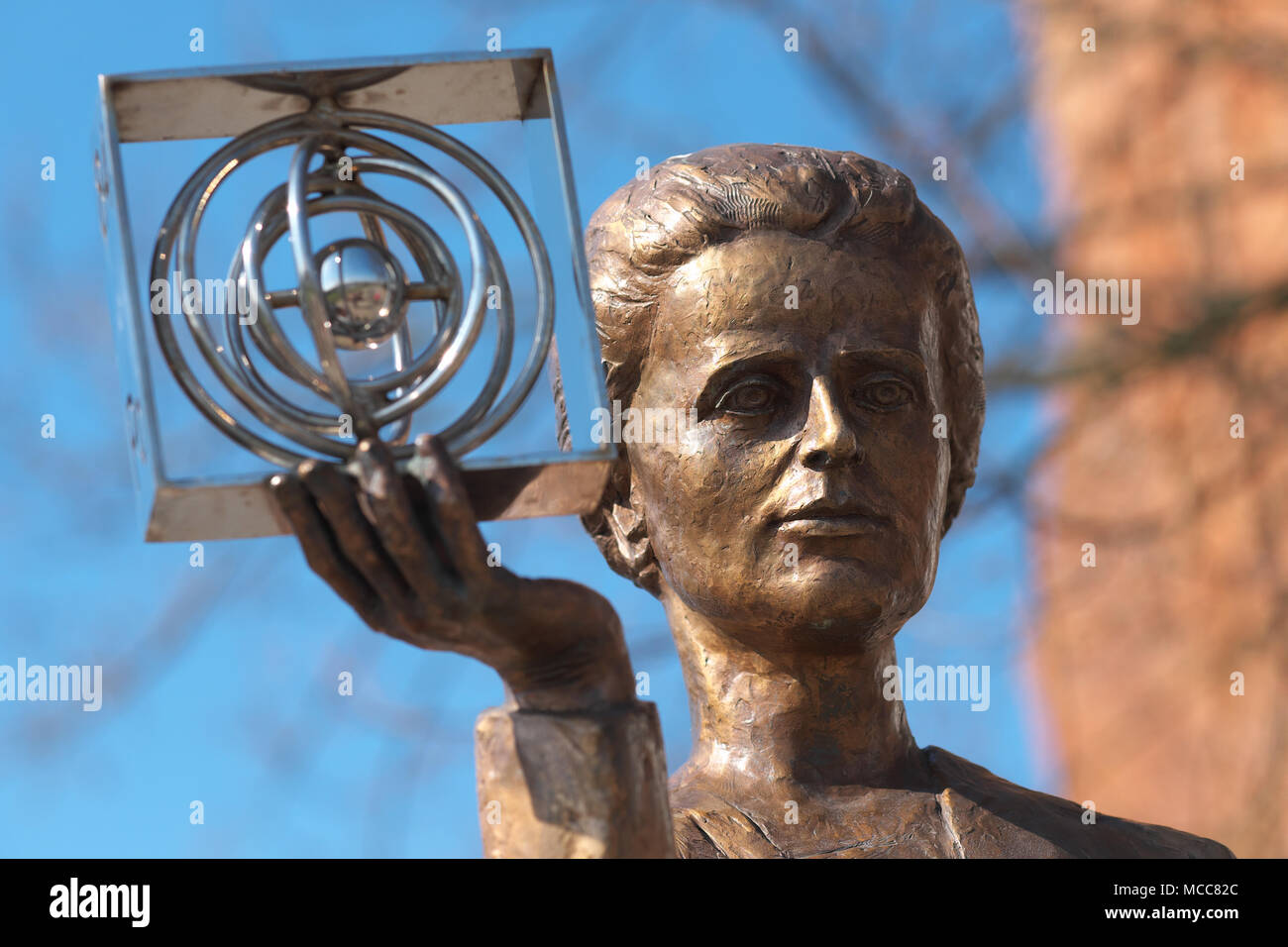 Warsaw Poland statue of Polish scientist Marie Sklodowska Curie holding ...