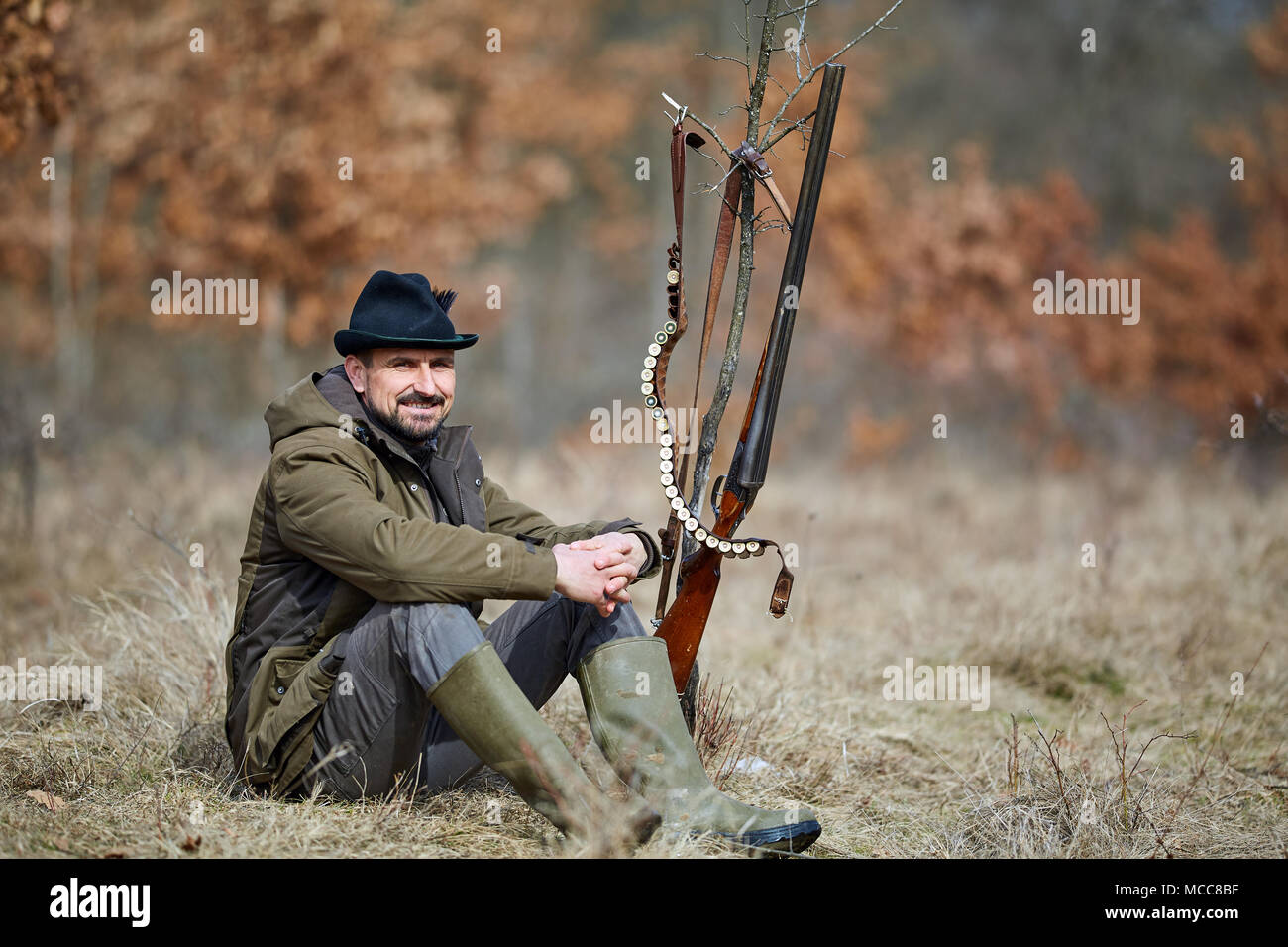 Hunter with double barrel gun in the forest looking for game Stock ...