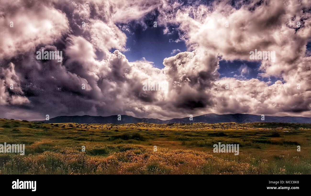 Cumulus clouds over prairie hi-res stock photography and images - Alamy