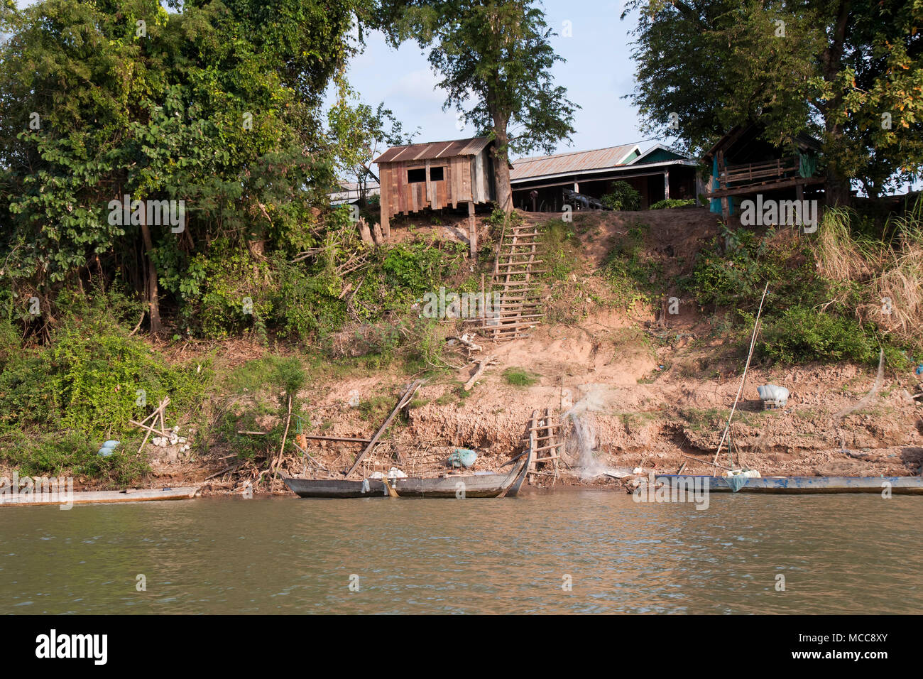 Stung Treng Cambodia, house on riverbank with ladder to waters edge ...