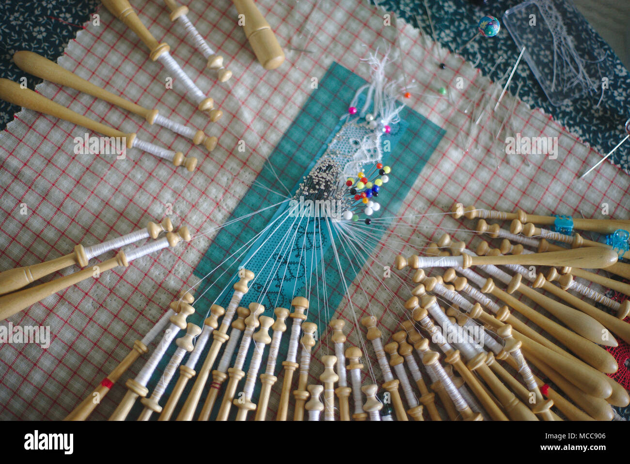 bobbin lacemaker work, crafts Stock Photo - Alamy