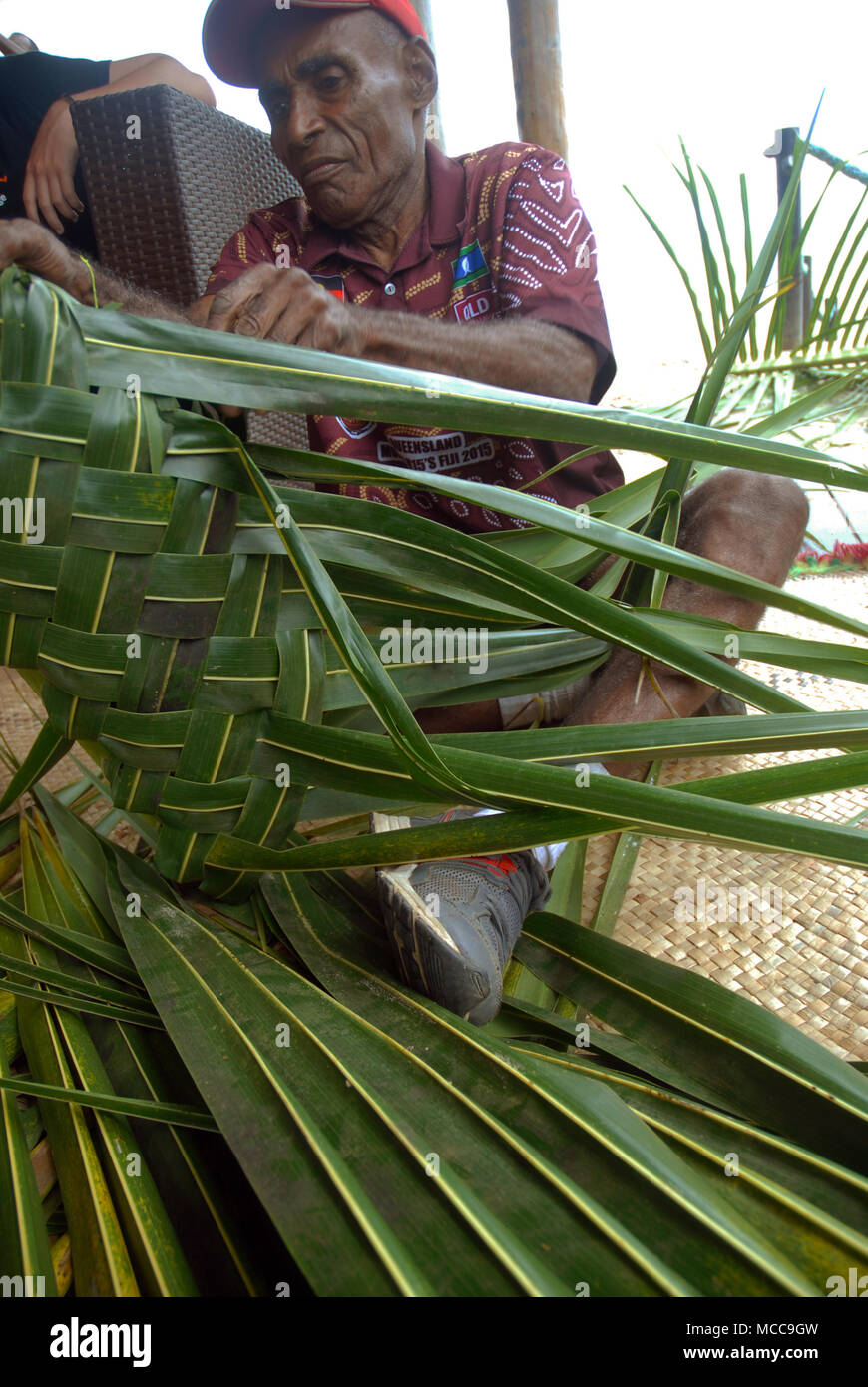 Weaving palm leaves craftsman hi-res stock photography and images - Alamy