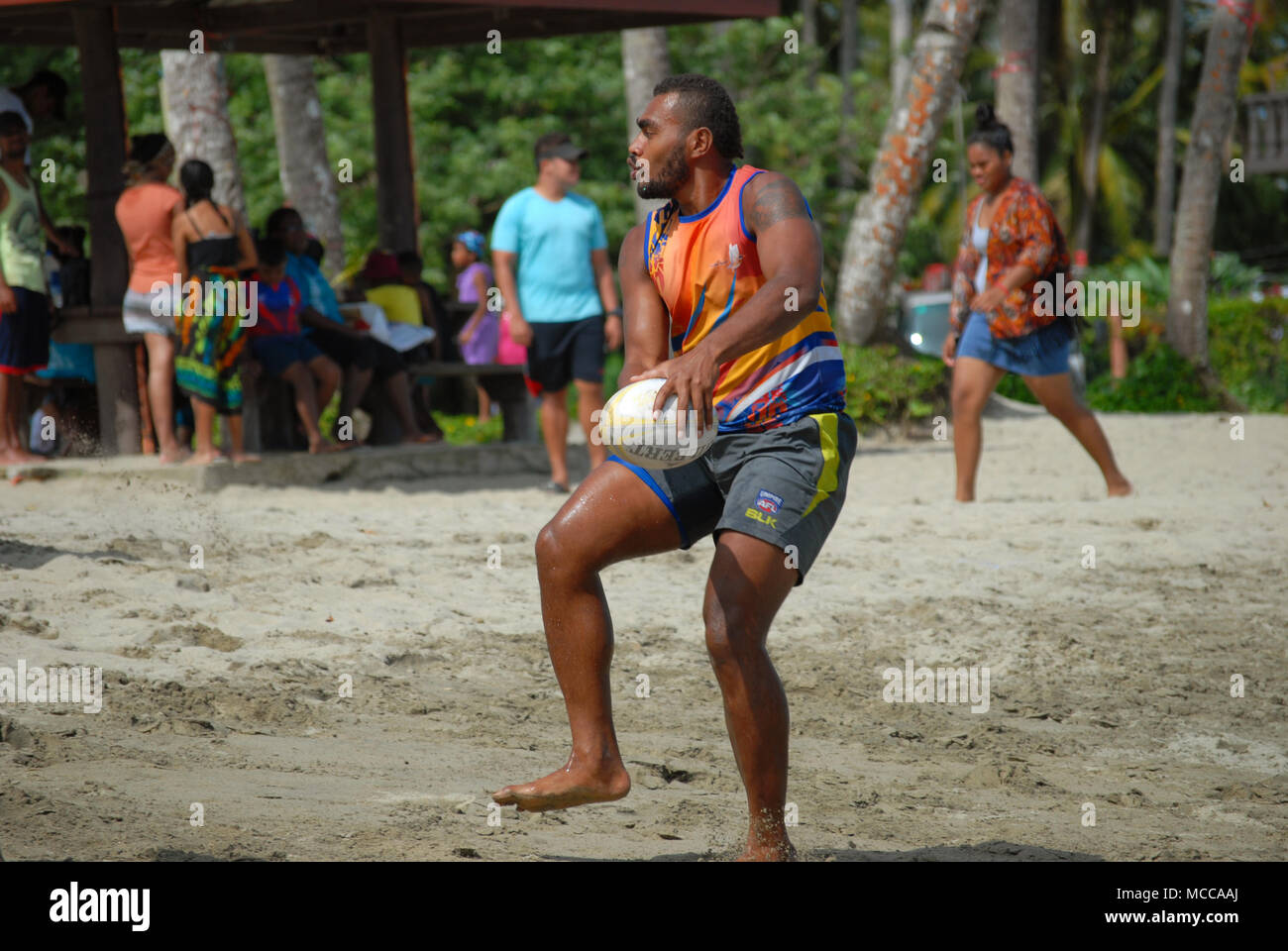 Fijian men playing rugby on Palm Beach, Pacific Harbour, Fiji Stock ...