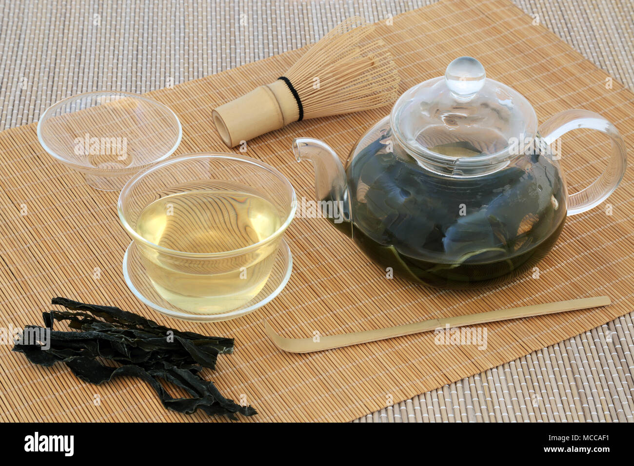 Japanese sencha wakame seaweed green tea with glass teapot and cup ...