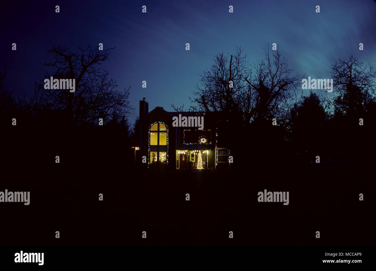 Christmas lights on a house in the country at night Stock Photo - Alamy