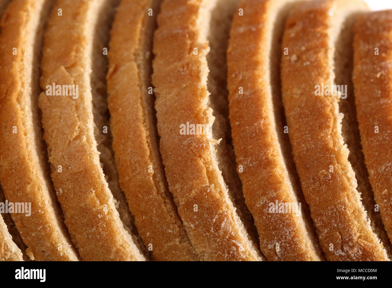 Bread cut into thin slices and ready to taste it for breakfast Stock ...