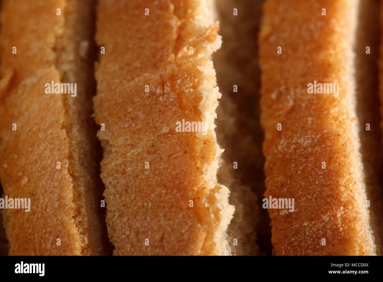 Bread cut into thin slices and ready to taste it for breakfast Stock ...