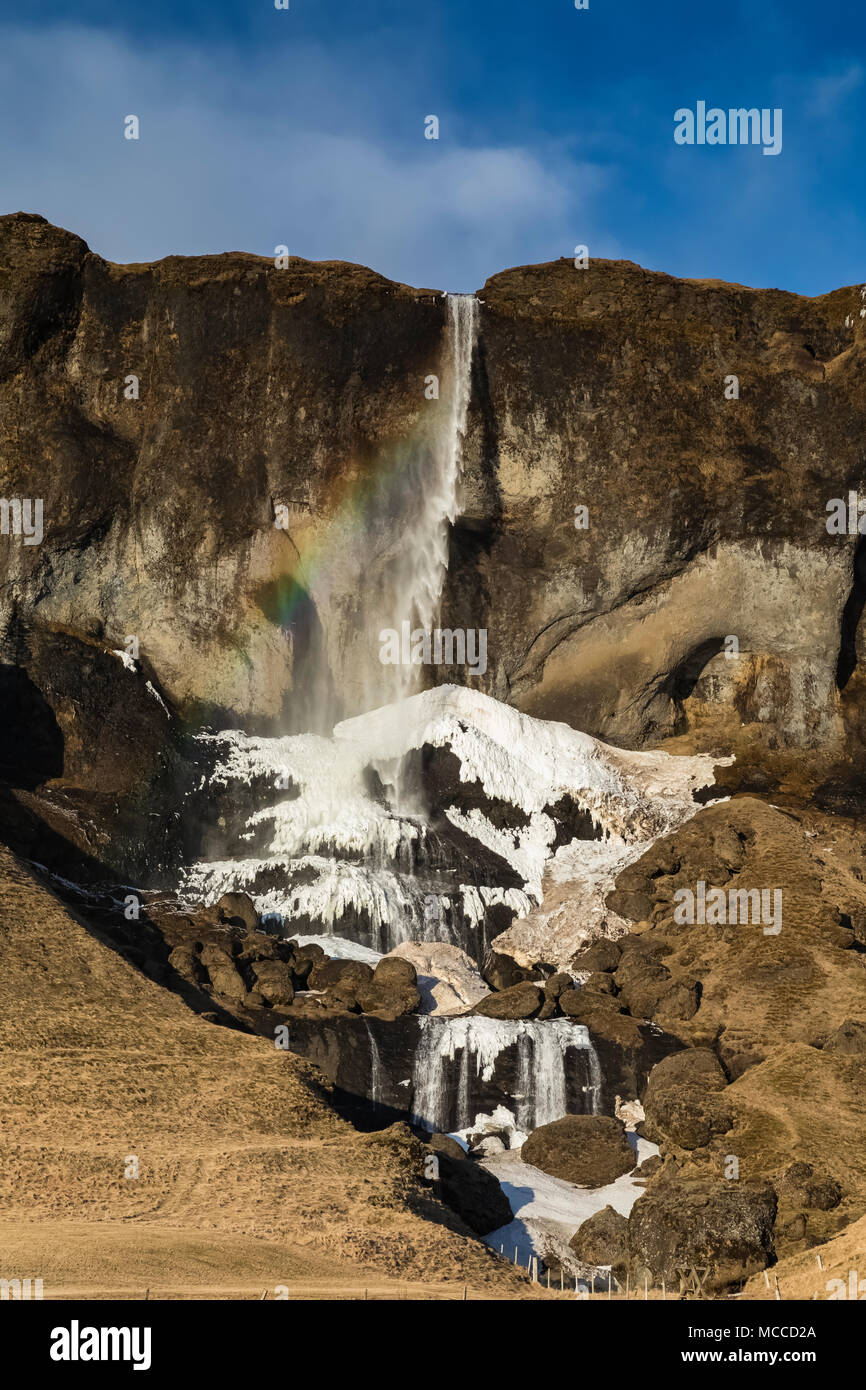 Foss á Síðu, aka Hamrafoss, a waterfall in winter in the hamlet of ...