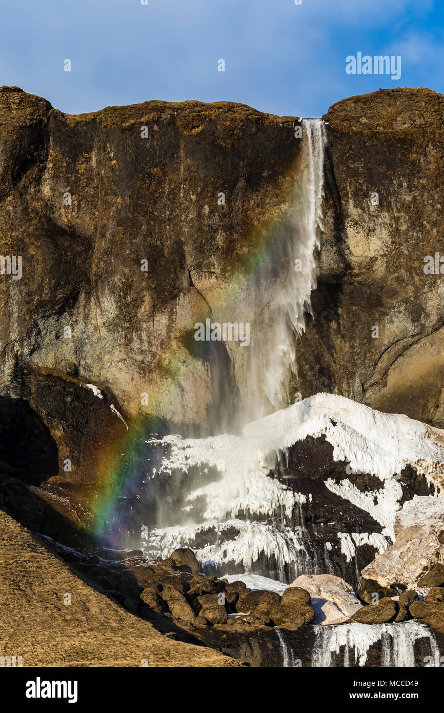 Foss á Síðu, aka Hamrafoss, a waterfall in winter in the hamlet of ...