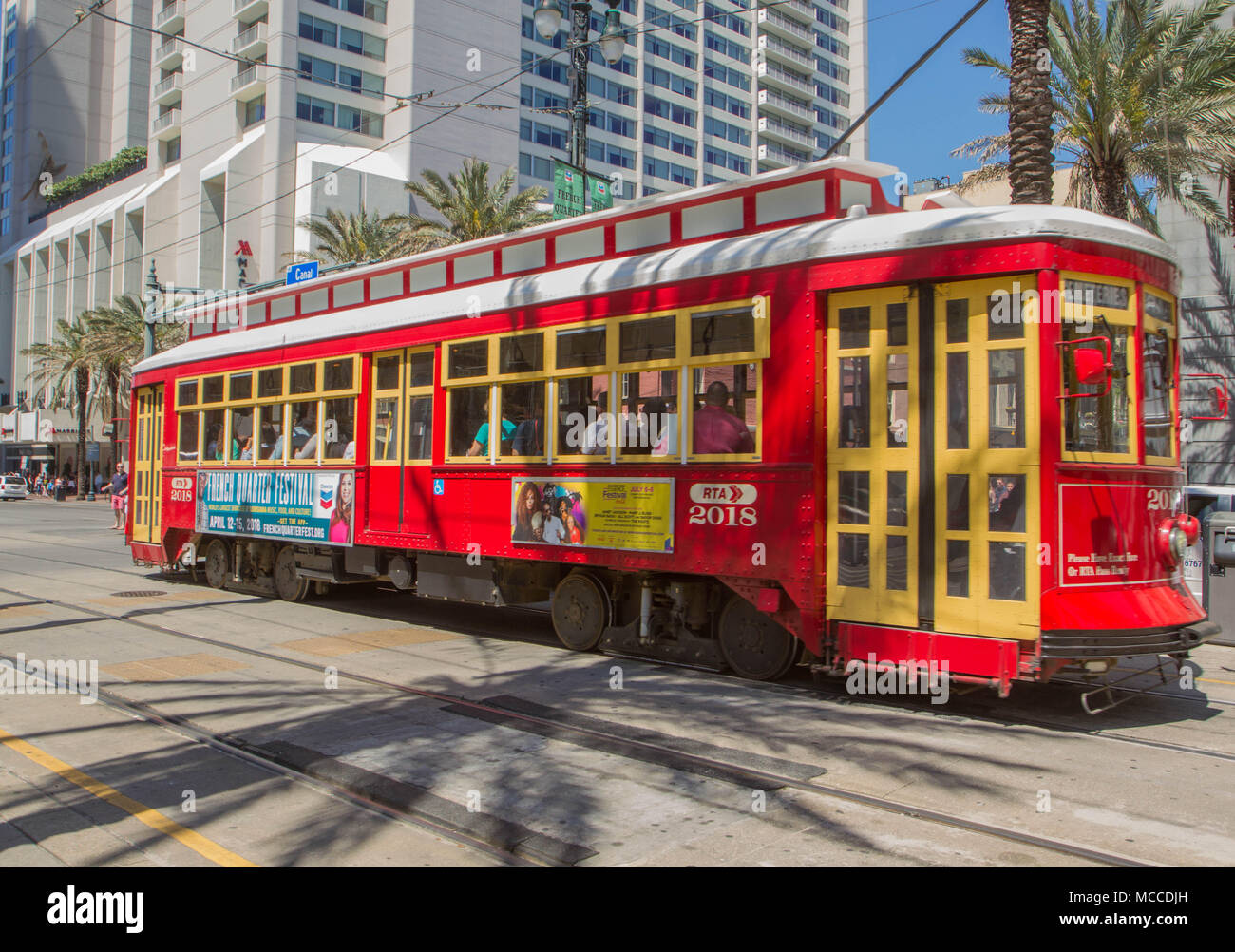 New Orleans Canal Street Streetcar. Color landscape image of red and ...
