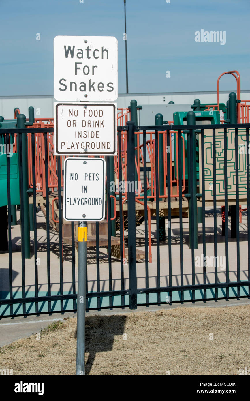 Quanah, Texas. Rest area rules signs with watch for snakes sign Stock ...