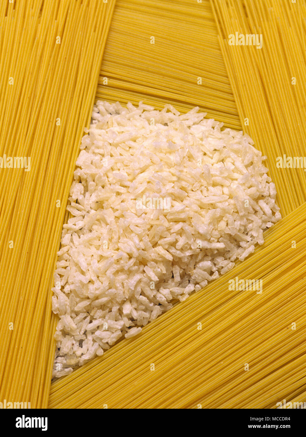 Still life of pasta and rice. Spaghetti and white rice Stock Photo - Alamy
