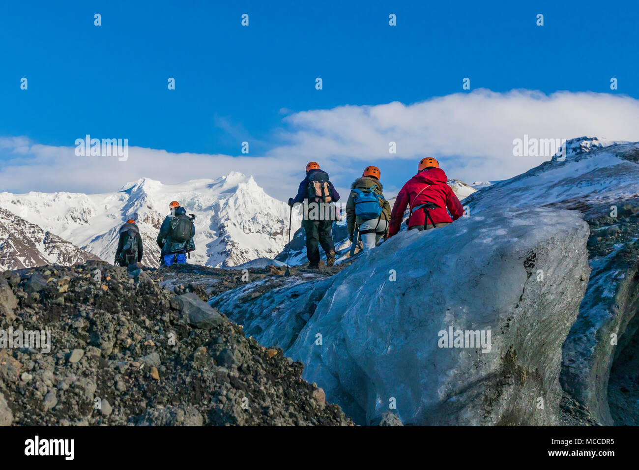 Group during ice cave tour of caves and crevasses in Svinafellsjökull ...