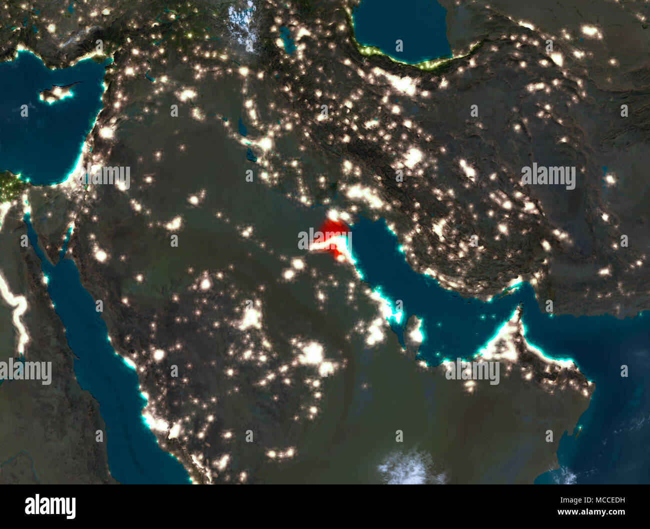 Country of Kuwait in red on planet Earth with clouds at night. 3D ...