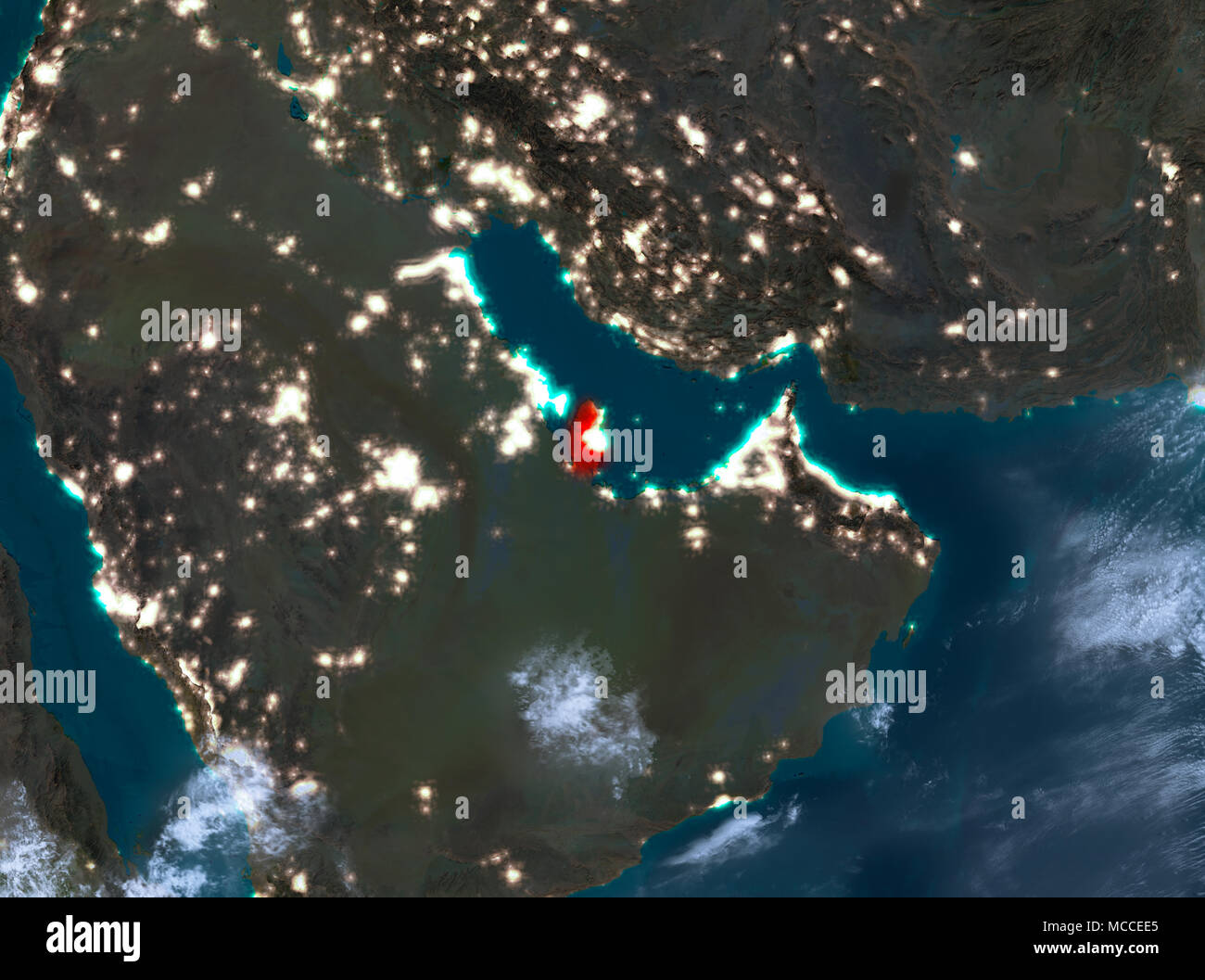Country of Qatar in red on planet Earth with clouds at night. 3D ...