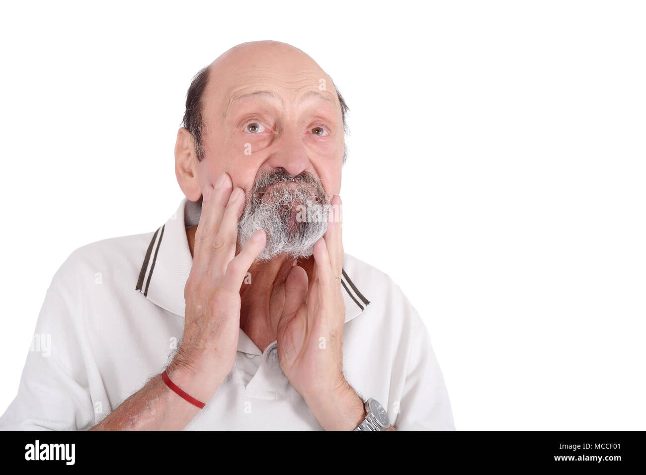 Portrait of elderly man thinking. Isolated white background Stock Photo ...