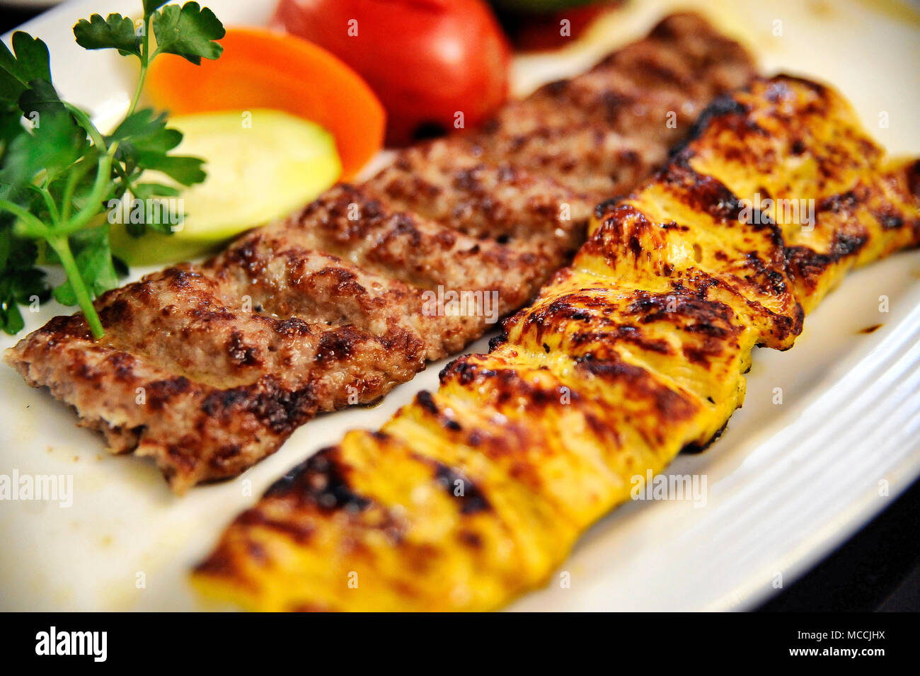 Iranian food: skewers of mutton and chicken - Tehran, Iran Stock Photo ...