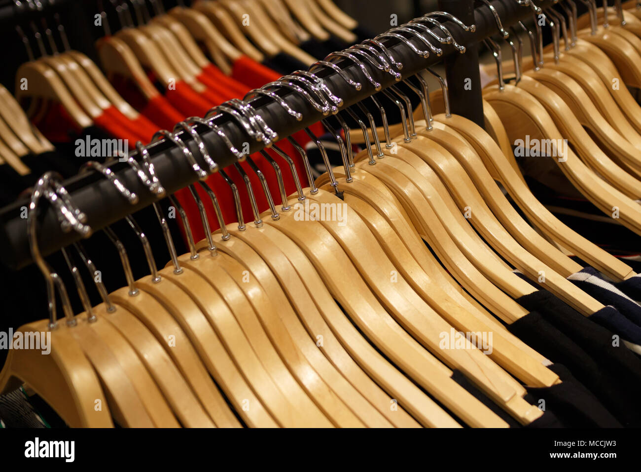 clothes on a hanger in a store. Shopping mall Stock Photo - Alamy