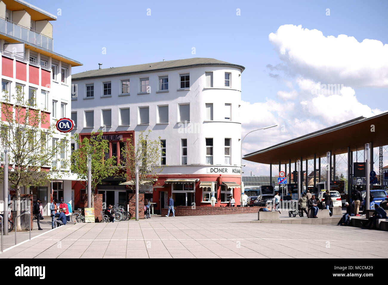 Ruesselsheim, Germany - April 11, 2018: Travelers and passers-by are ...