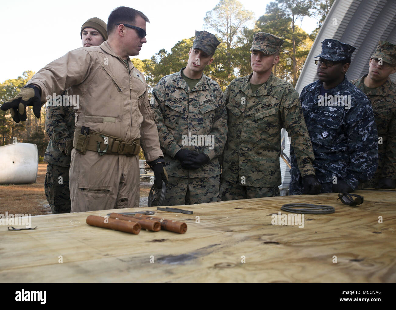 An Explosive Ordnance Disposal Marine gives a lesson to Marines and ...