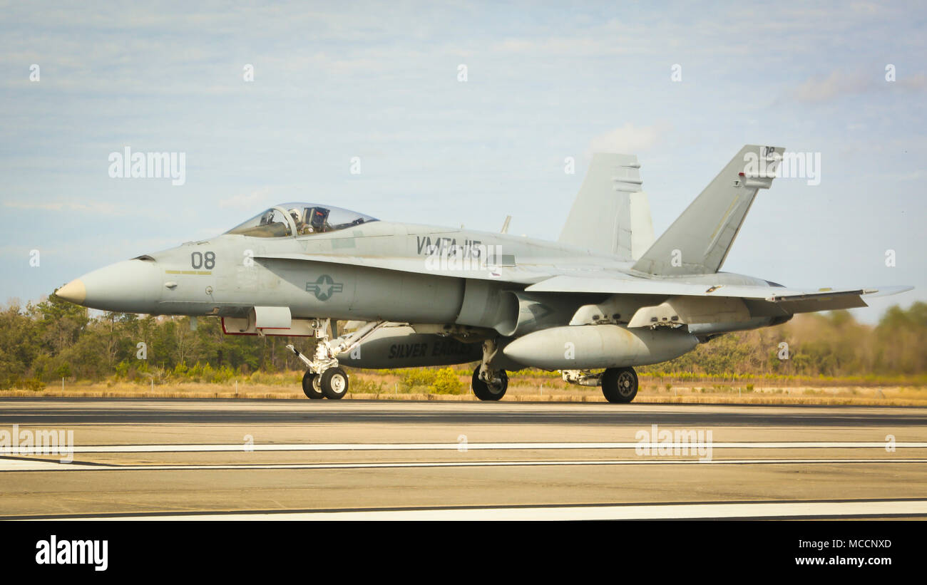 An F/A-18C Hornet conducts Field Carrier Landing Practice aboard Marine ...