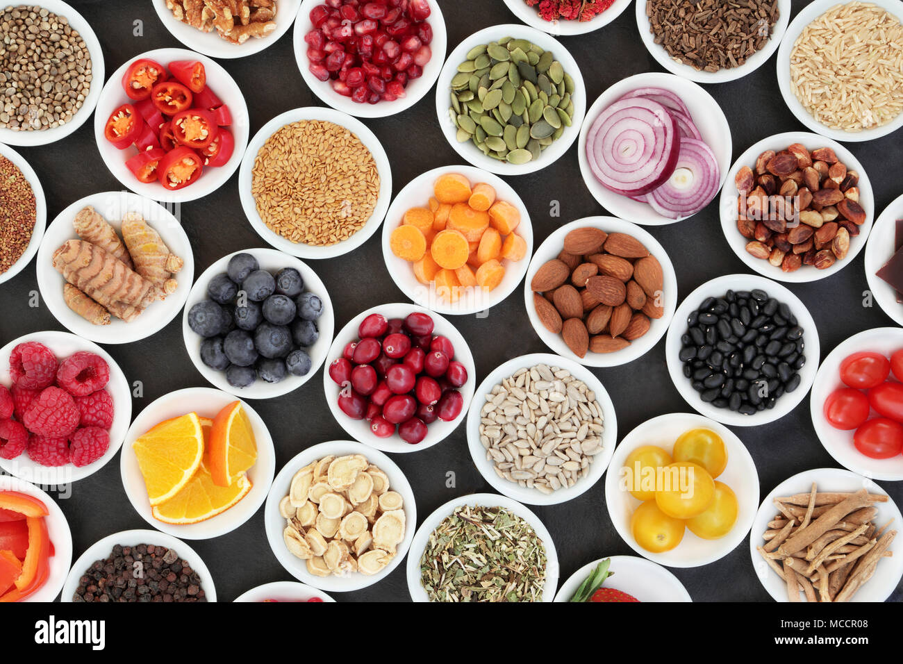 Health food for a healthy heart with vegetables, fruit, grains, pulses ...