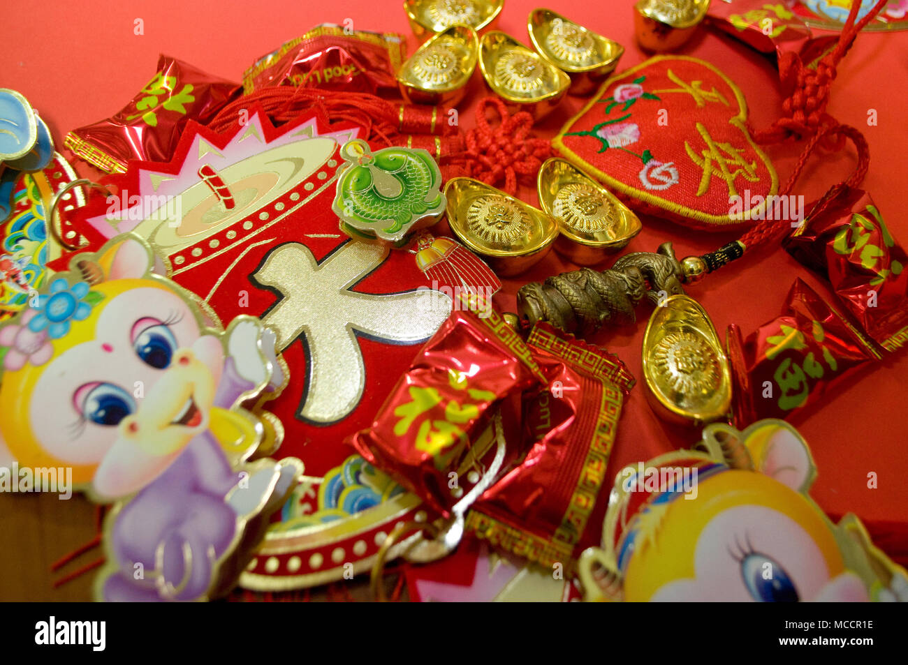 During Chinese New Year, many trinkets are sold at festivals to ...