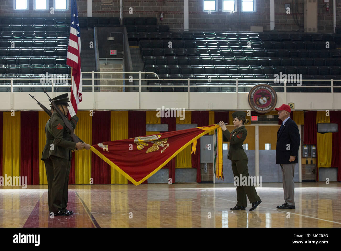 A U.S. Marine with 2nd Marine Division (2d MARDIV), left, and a 2d ...