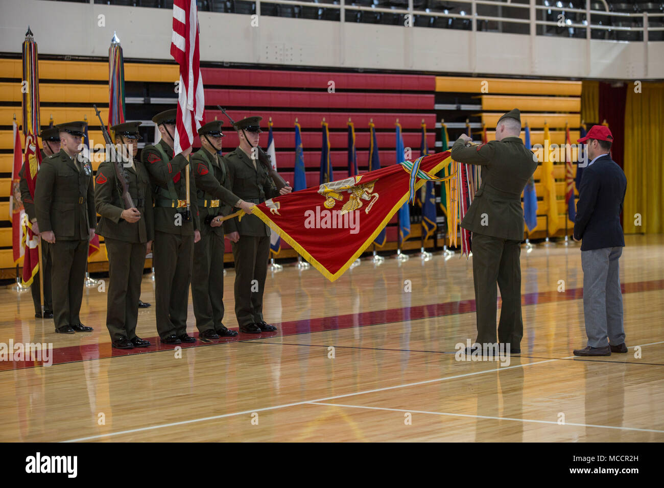 A U.S. Marine with 2nd Marine Division (2d MARDIV), left, and a 2d ...