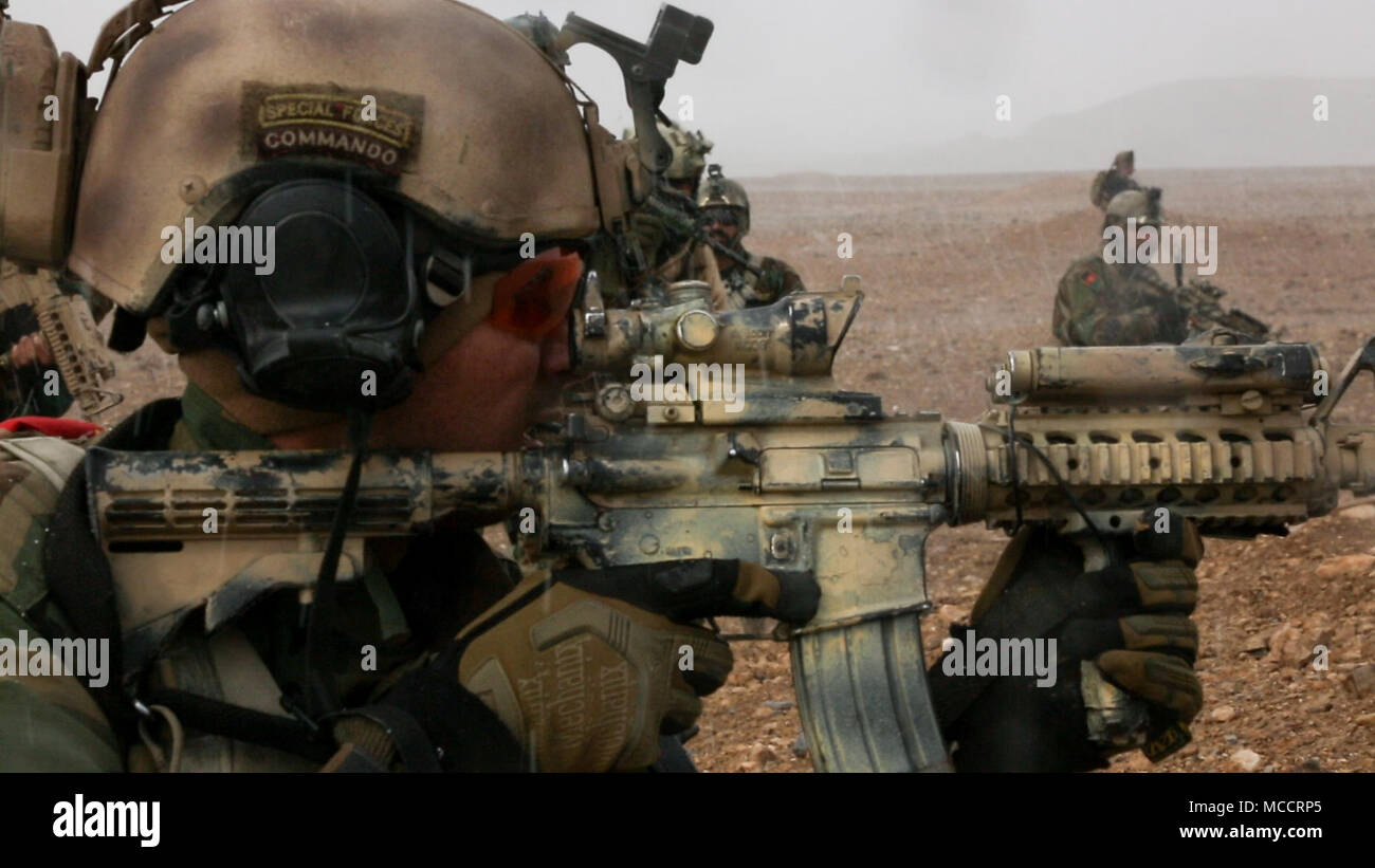 Commandos from the 6th Special Operations Kandak demonstrate the ...