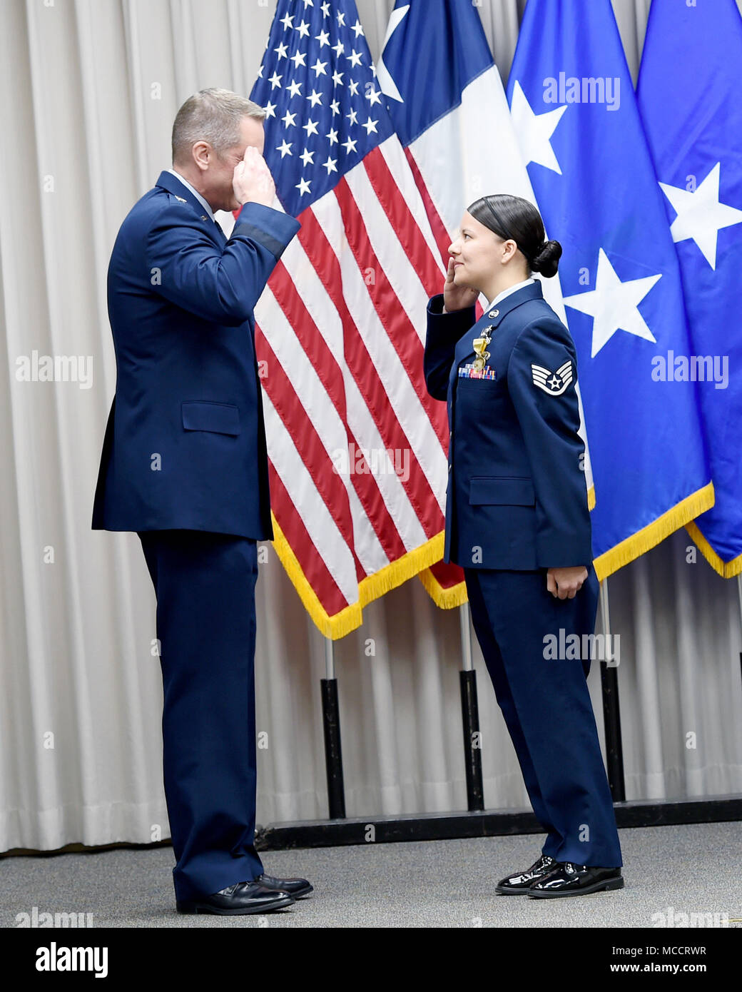 Staff Sgt. Desiree Ng, 149th Medical Group, salutes Maj. Gen. David ...