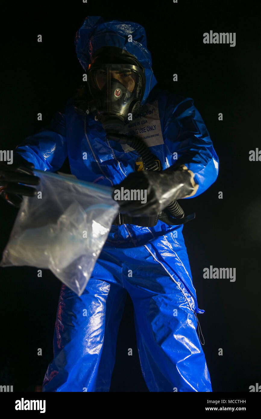 Cpl. Bryan J. Carofeliciano, a chemical, biological, radiological, and ...