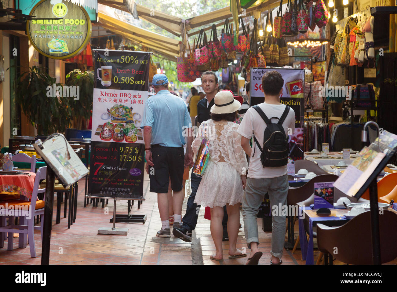 Siem Reap market - tourists shopping in Siem Reap market, Cambodia Asia ...