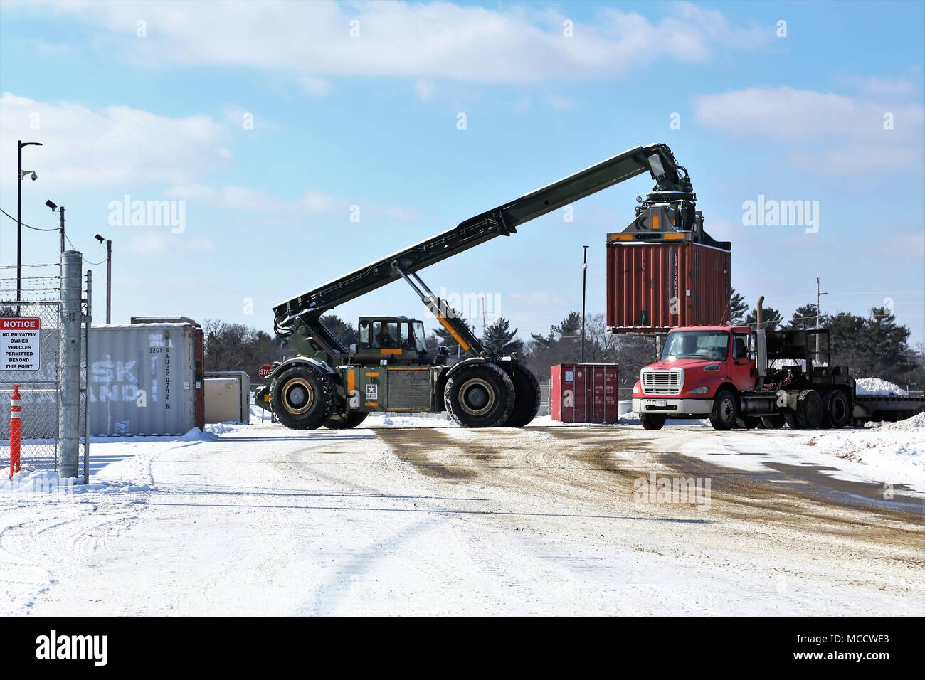 A heavy-equipment operator with the Logistics Readiness Center ...