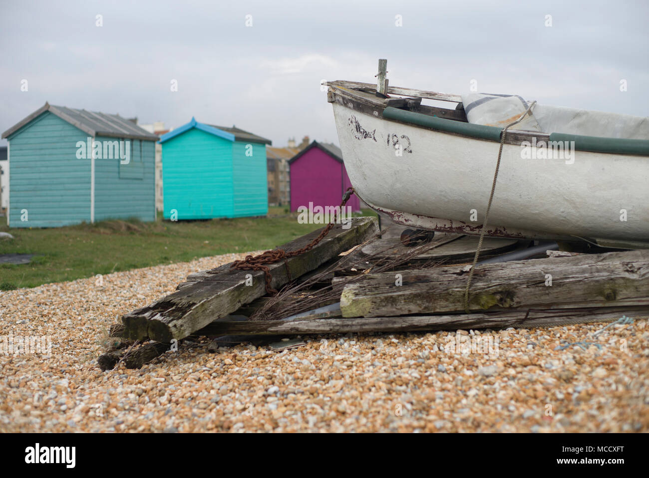 Boat on a shingle beach Stock Photo - Alamy
