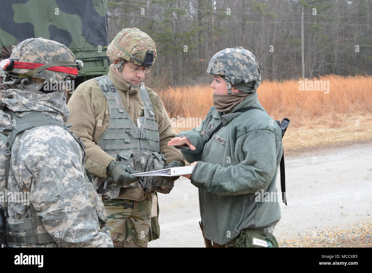 First Lt. Raquel McKenna (right), executive officer for Headquarters ...